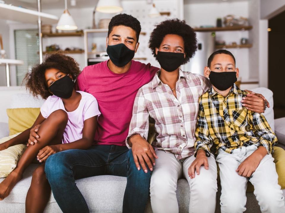 Family wearing masks | Irish Cancer Society